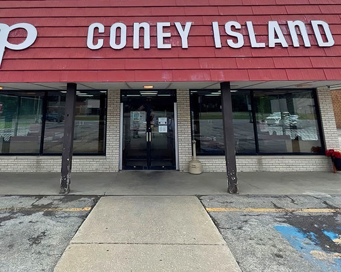 M+P Coney Island's bright red facade isn't just eye-catching – it's a beacon of hope for hungry travelers seeking hot dog nirvana.