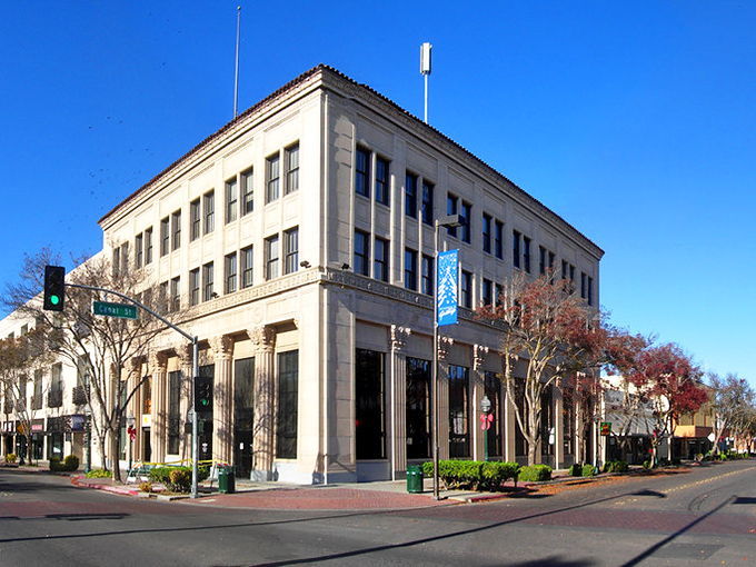 Merced's stately buildings stand as testament to California's architectural heritage. Even the traffic lights seem to pause in respect.