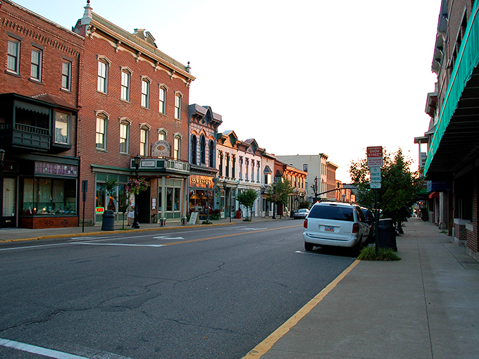 Golden hour transforms this Amish country street into a Norman Rockwell painting come to life.