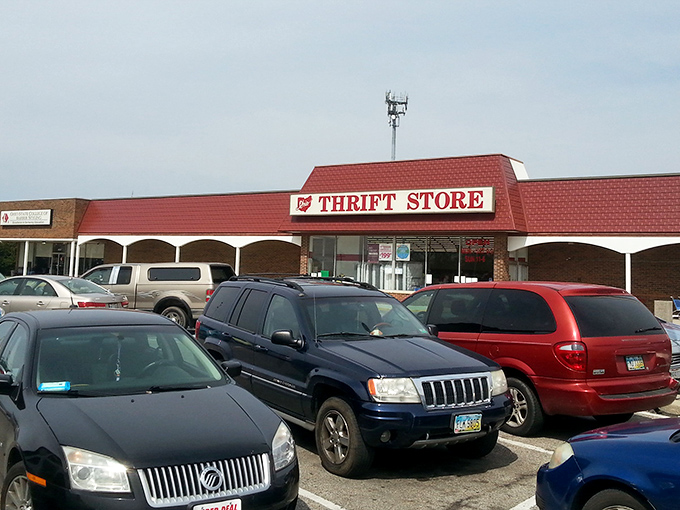 Ohio Thrift's bright red roof stands out like a beacon for bargain hunters. The packed parking lot tells you everything you need to know about what's inside.