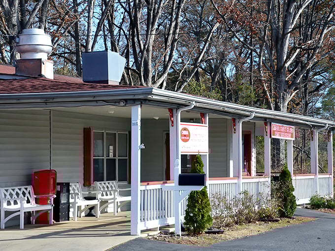 Omega Coney Island's charming cottage exterior hides a Detroit-style hot dog paradise. That porch has heard thousands of "mmm" sounds.