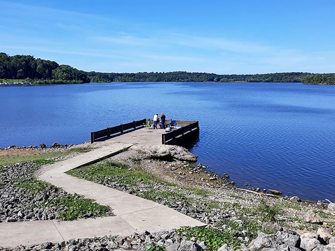 Paint Creek's fishing pier stretches into blue waters like an invitation to adventure. Fish are optional, but daydreaming is mandatory!
