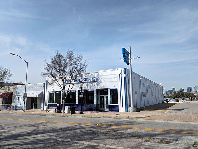 Paris Coffee Shop's crisp white exterior houses breakfast traditions that have stood the test of time in Fort Worth.