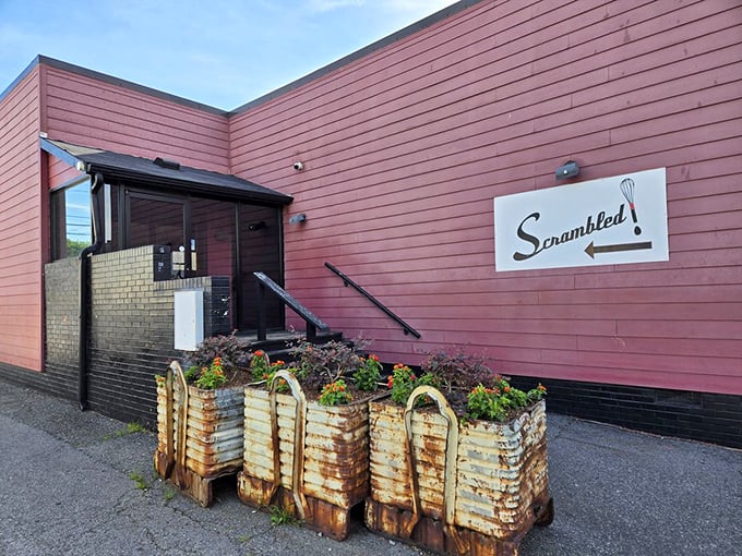 That unassuming pink exterior hides Scrambled's breakfast magic &ndash; proof that the best Southern food never needs to shout.