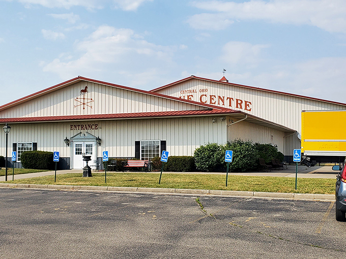 The Central Ohio Antique Centre stands proud with its weather vane pointing toward history. A barn-like building filled with yesterday's treasures.