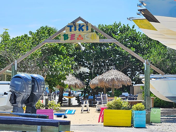 Tiki 52's colorful entrance sign welcomes boaters and landlubbers alike to this waterfront paradise where the party never stops.
