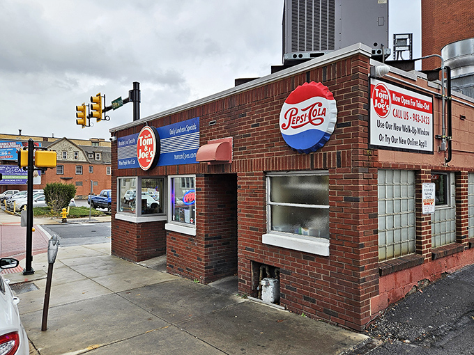 Tom & Joe's brick facade stands proudly on Altoona's 13th Avenue. That neon sign has guided hungry locals through decades of comfort food cravings.