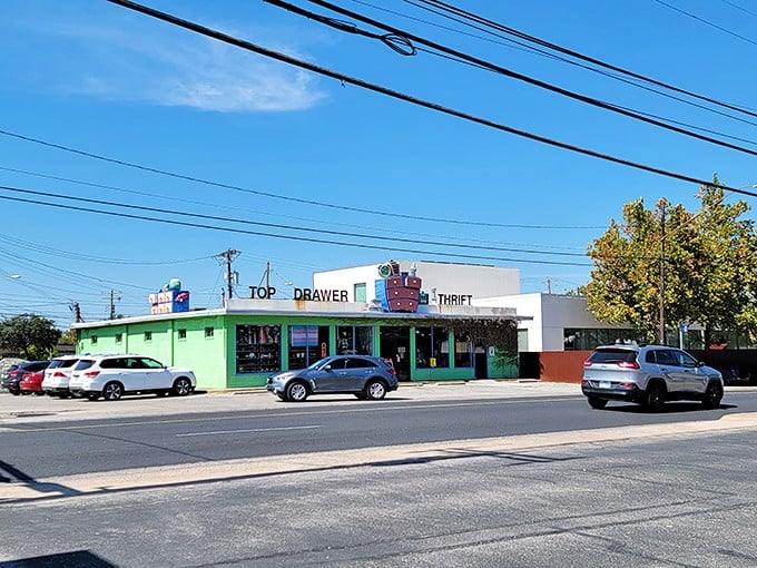Top Drawer's vibrant green facade stands out like the first sprout of spring savings in Austin's thrift landscape.