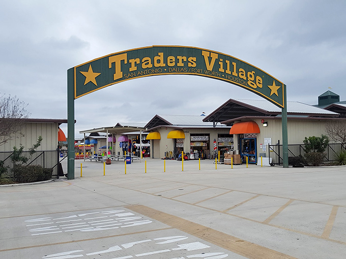Gateway to bargain heaven! Traders Village's iconic entrance arch promises a Texas-sized adventure of shopping and discovery.
