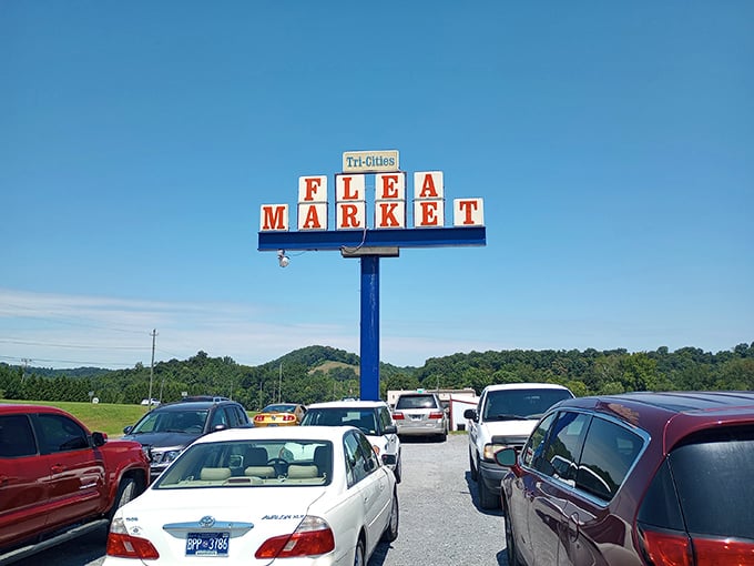 The iconic Tri Cities Flea Market sign stands tall against the Tennessee sky. Like a beacon for bargain hunters everywhere!