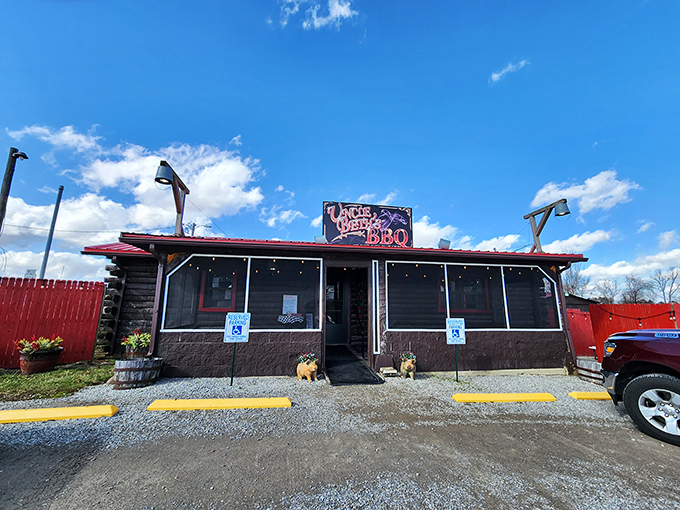 Uncle Beth's BBQ's rustic cabin charm comes with a side of adorable dog statues &ndash; guardians of the smoky treasures within.