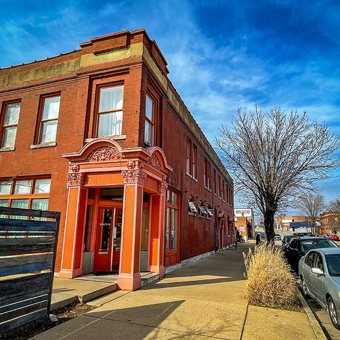 Union Loafers' striking orange doorway stands like a portal to sandwich nirvana in this historic brick building.