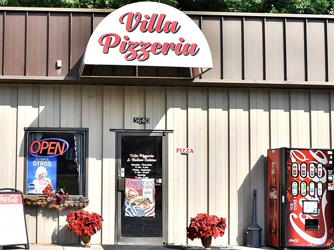 Villa Pizzeria's humble exterior is the Clark Kent disguise for Superman-level pizza. Don't judge this book by its cover!