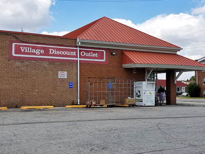 Village Discount Outlet's distinctive red roof has sheltered generations of thrifty Hoosiers. Like a barn raising for bargain hunters.