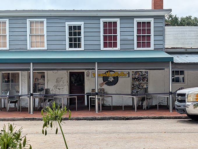Vinnie Van GoGo's blue facade whispers "come in" while the pizza inside shouts "you're welcome!"