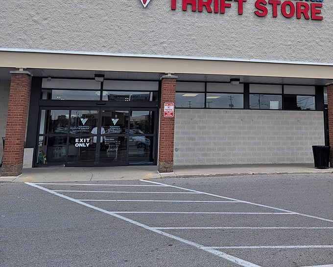 The Volunteers of America store entrance - where your grandmother's discarded lamp becomes someone else's vintage find.