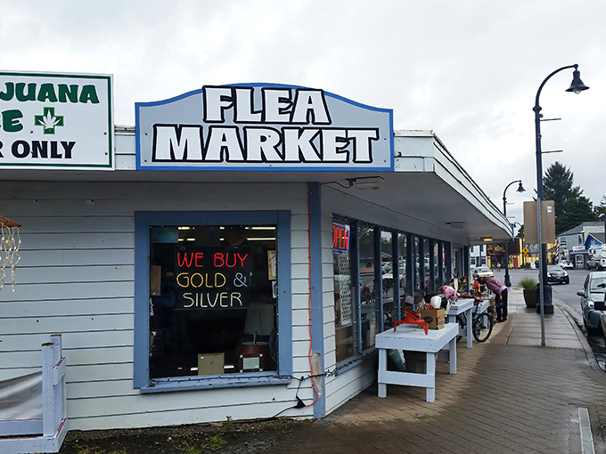 "We buy gold & silver" promises the neon sign, but the real treasures at Waldport Flea Market might be the stories behind each curious item.