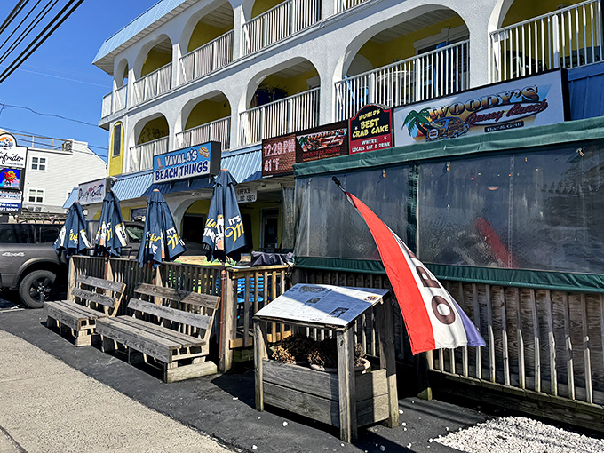 Woody's Beach Things sits beneath yellow arches like a seafood speakeasy &ndash; where crab cakes are the password to culinary bliss.