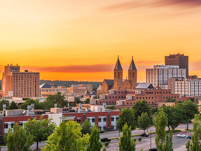 Sunset paints Akron in golden hues, transforming ordinary buildings into treasures. Like finding designer shoes at thrift store prices&mdash;affordable beauty at its finest.