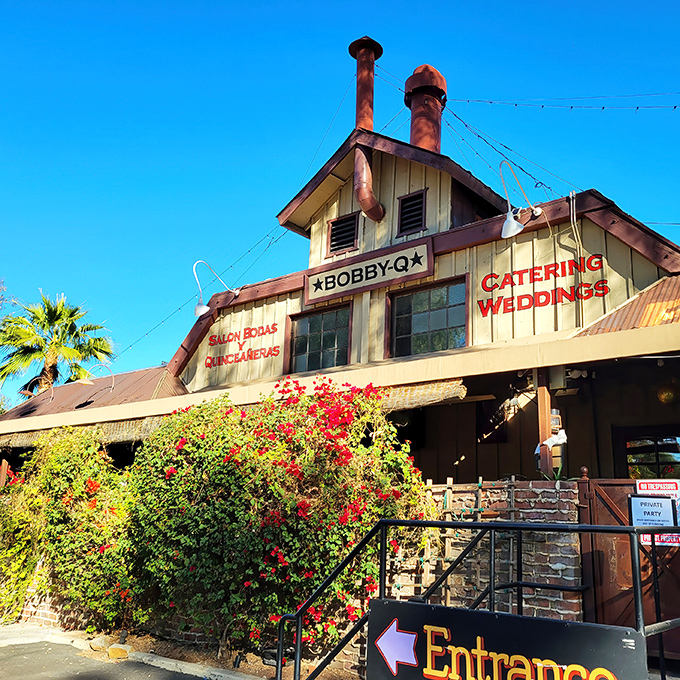The entrance to Bobby-Q beckons with rustic charm and the promise of smoky delights. Follow your nose and thank me later.