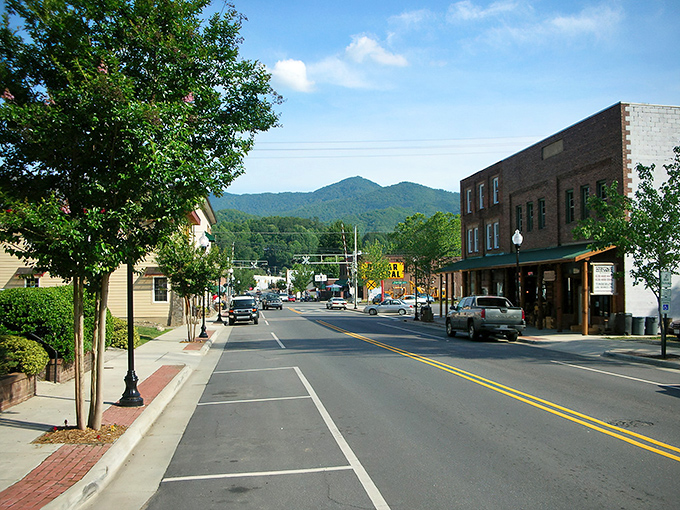 Historic buildings stand shoulder to shoulder, watching over a town that refuses to be rushed.