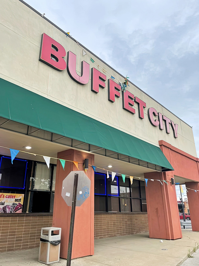 The colorful pennants flutter like a welcome flag for hungry seafood lovers. This place knows that good food doesn't need fancy packaging.