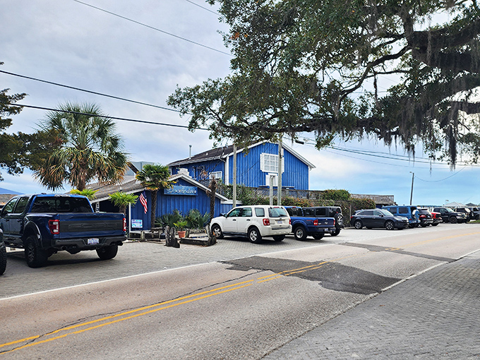 Palm trees and patriotism welcome you to this waterfront gem where seafood arrives fresher than your vacation photos.