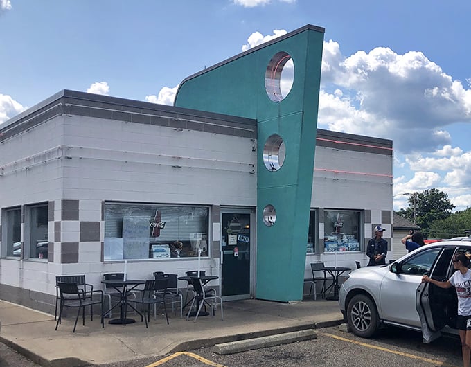 Those circular windows at Doug's aren't just design elements &ndash; they're portals to a time when "fast food" meant made-to-order, not mass-produced.