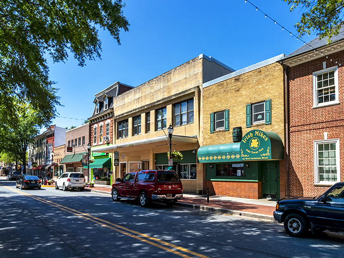 Red brick buildings and wide sidewalks create an inviting streetscape where history meets modern convenience in Dover's heart.