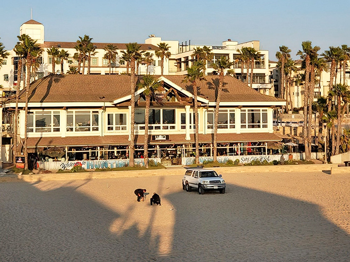 Sunset dining with palm trees standing guard. This beachfront beauty glows golden as day turns to dusk.