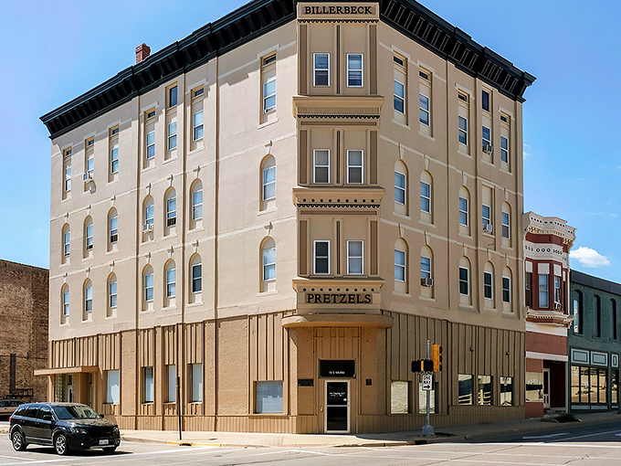 The Billerbeck Building stands tall like a distinguished gentleman in his Sunday best, watching over Freeport's charming streets.