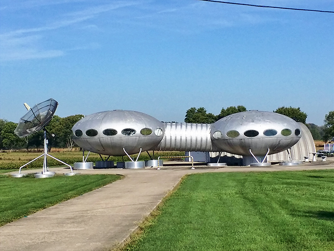 "E.T. phone Ohio!" This retro flying saucer house makes suburban living look like a scene from The Jetsons.