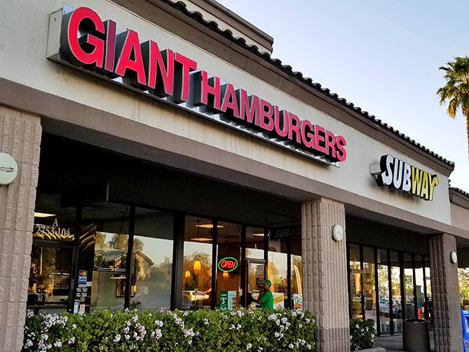 Nestled between everyday shops, this burger haven proves that "giant" isn't just marketing - it's a solemn promise to your appetite.