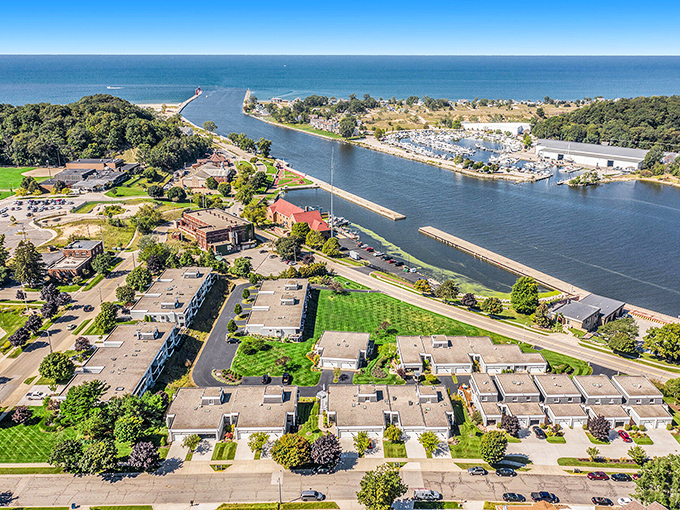 Grand Haven: Those twin piers stretching into Lake Michigan like arms welcoming you home. Hallmark should be filming here right now!