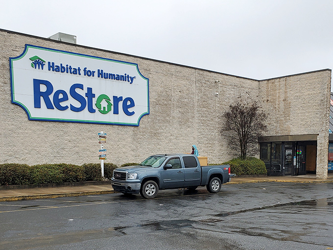 Rain can't dampen the deals at this ReStore. Inside those doors, kitchen cabinets and lighting fixtures await their second chance.