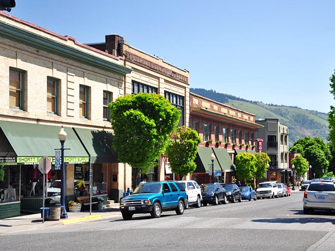 Historic downtown buildings stand proudly against blue skies, offering a main street straight from your small-town dreams.