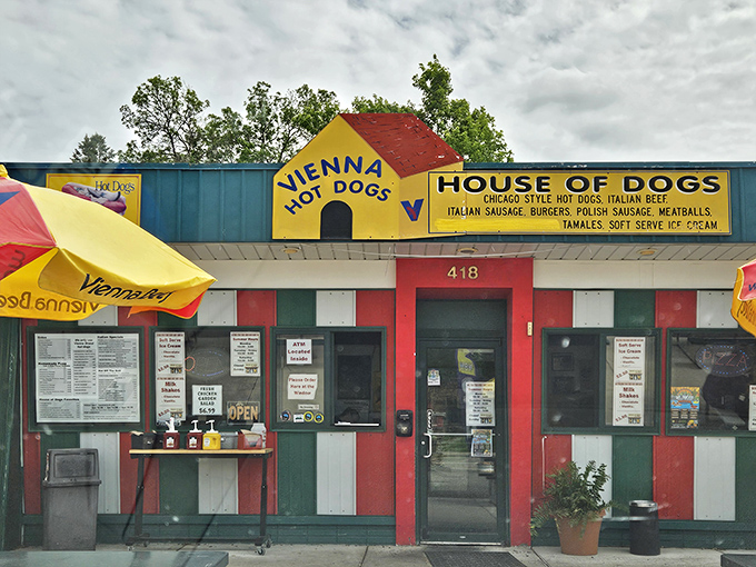 Red and white stripes, yellow signage, and picnic tables ready for action. House of Dogs isn't just a meal—it's a summer tradition in Eagle River.