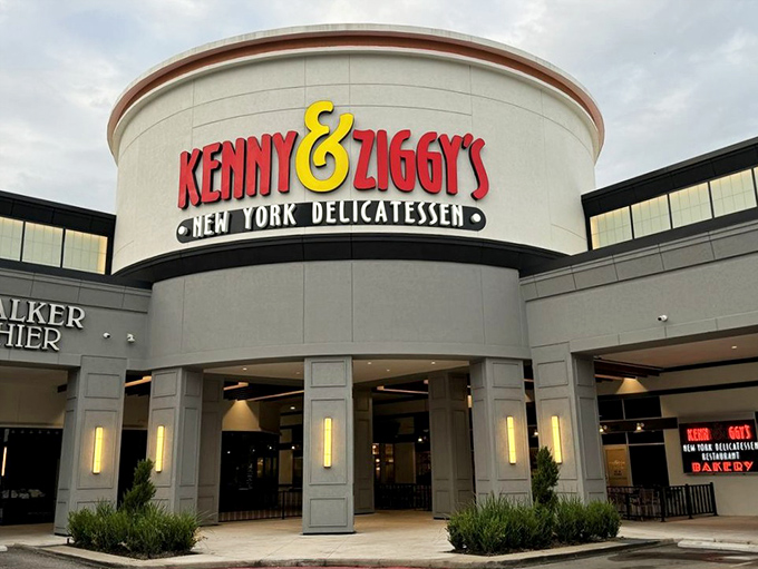 This isn't just a restaurant entrance—it's a portal to pastrami paradise. Kenny & Ziggy's stands proud against the Texas sky.