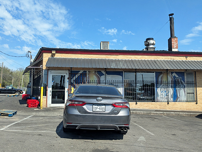 Sunshine illuminates LC's no-frills exterior &ndash; a BBQ landmark where smoke signals have been calling Kansas City's hungry for decades.
