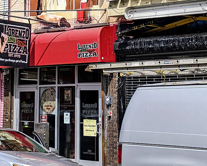 Where pizza boxes stack as high as expectations &ndash; Lorenzo's serves slices that require a two-handed approach.
