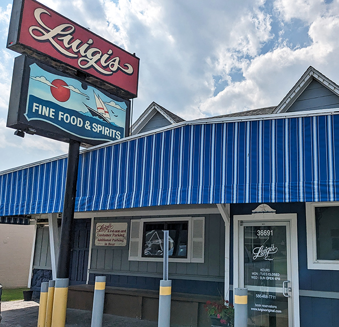 Bright blue siding and a classic sign &ndash; Luigi's looks like it was plucked straight from a perfect summer day on the lake.