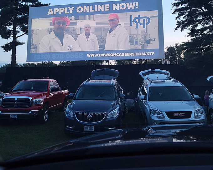Cars line up in perfect rows, each one a private living room with the best view in the house.