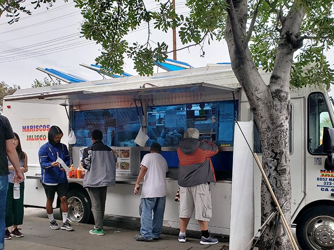 The line forms for a reason. These seafood magicians turn a simple taco truck into a coastal Mexican vacation.
