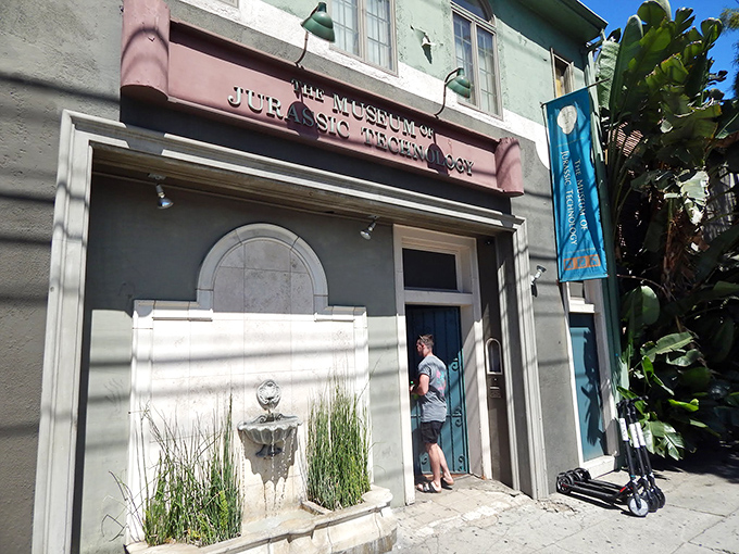 The unassuming entrance perfectly captures the enigmatic spirit of this mind-bending cultural treasure.