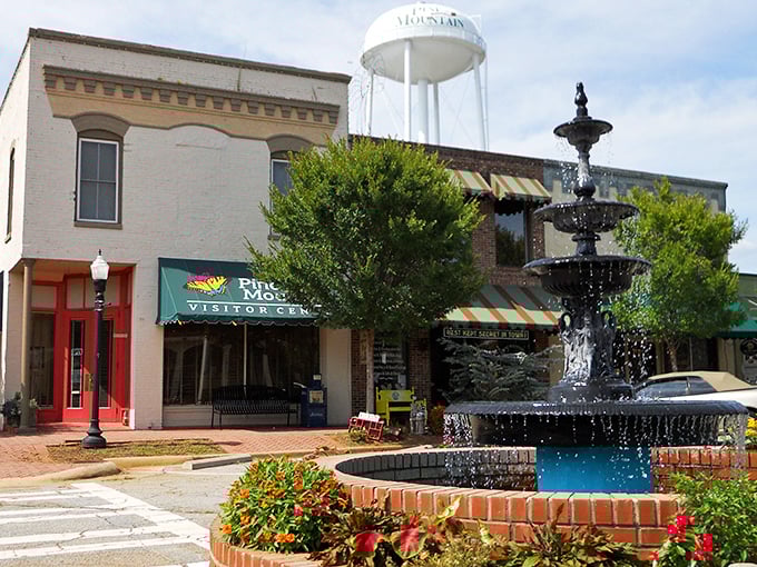 That fountain sparkles like the town's spirit, surrounded by buildings that know how to age gracefully.