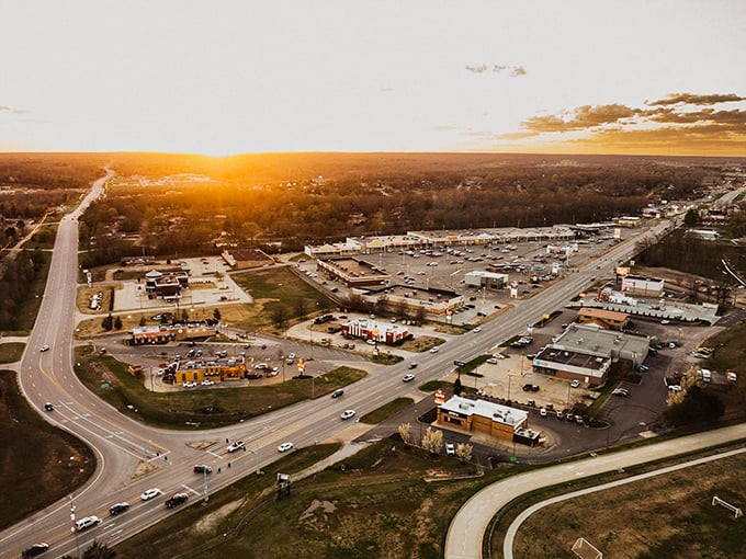 Sunset paints Poplar Bluff's commercial district in golden hues. From this bird's eye view, you can almost see your dollar stretching further.