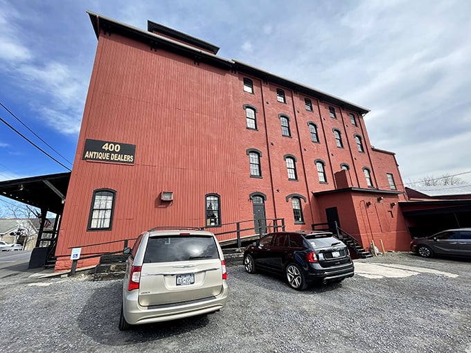 Like a massive red beacon for bargain hunters, this former mill now mills memories instead of grain.