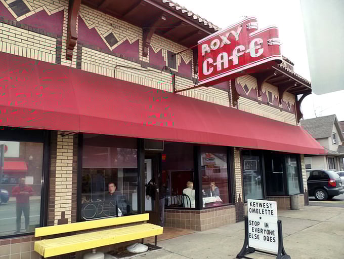 The neon "CAFE" sign isn't just advertising&mdash;it's a beacon of hope for anyone craving homestyle cooking.