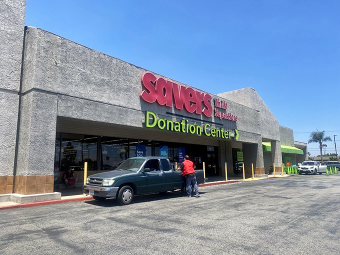 That cheerful Savers sign promises the kind of treasure hunting that makes you forget you're actually being practical.