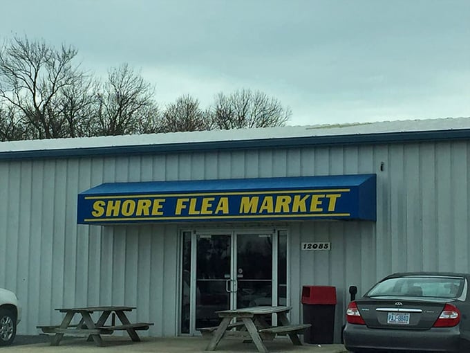 The blue awning beckons bargain hunters like a lighthouse for the thrifty. Eastern Shore treasures await!